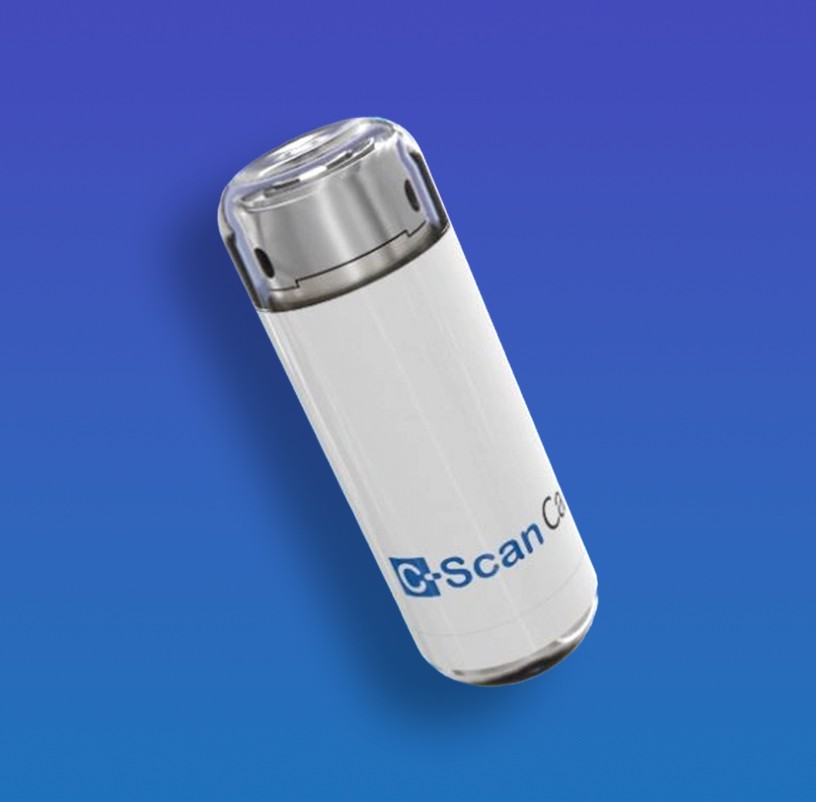 A semi-automatic machine for gluing ingestible capsules using UV light ...